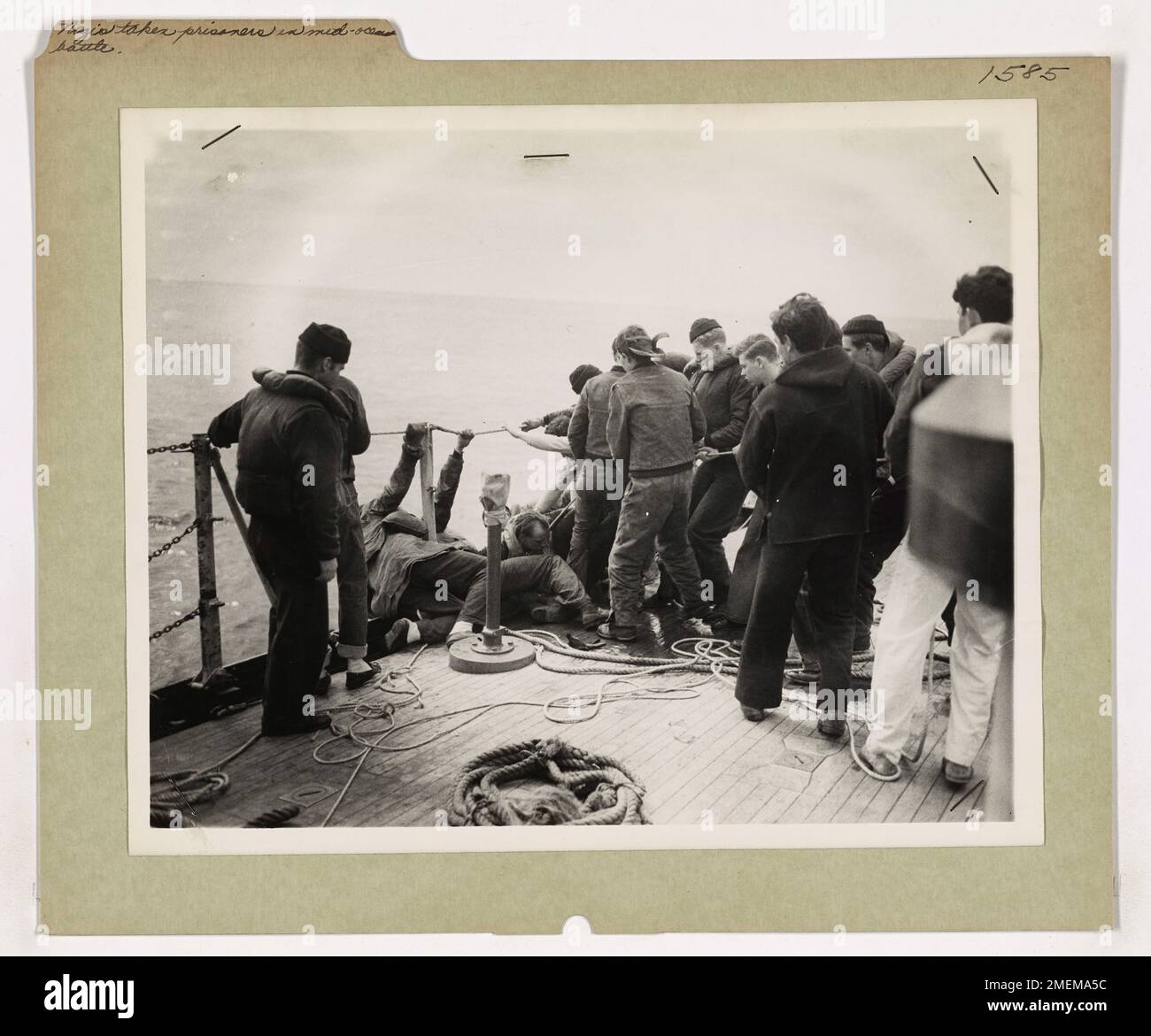 Captured German sailors are taken aboard a U.S. Coast Guard cutter ...