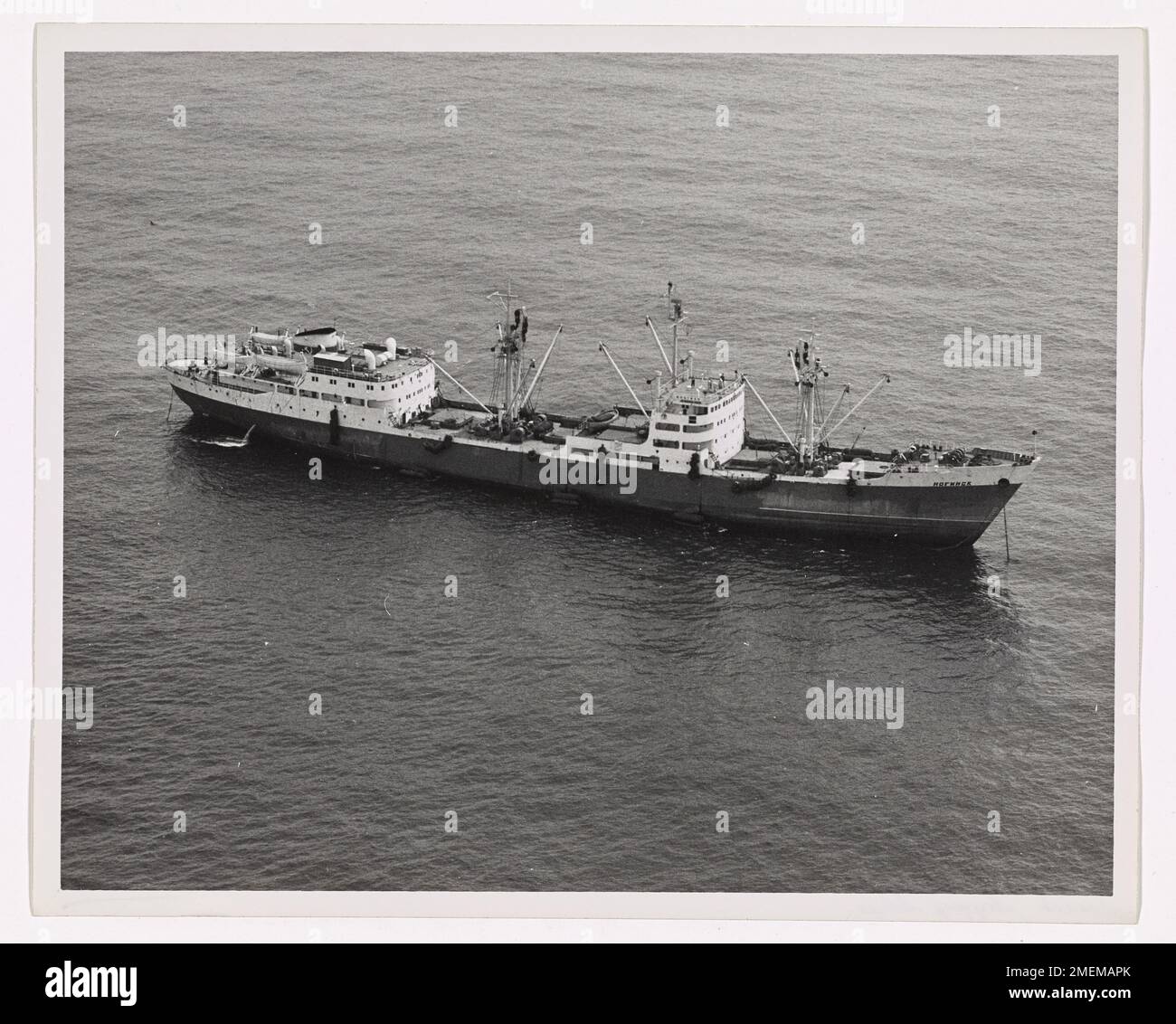 A small Soviet supply ship is depicted, likely engaged in transport ...