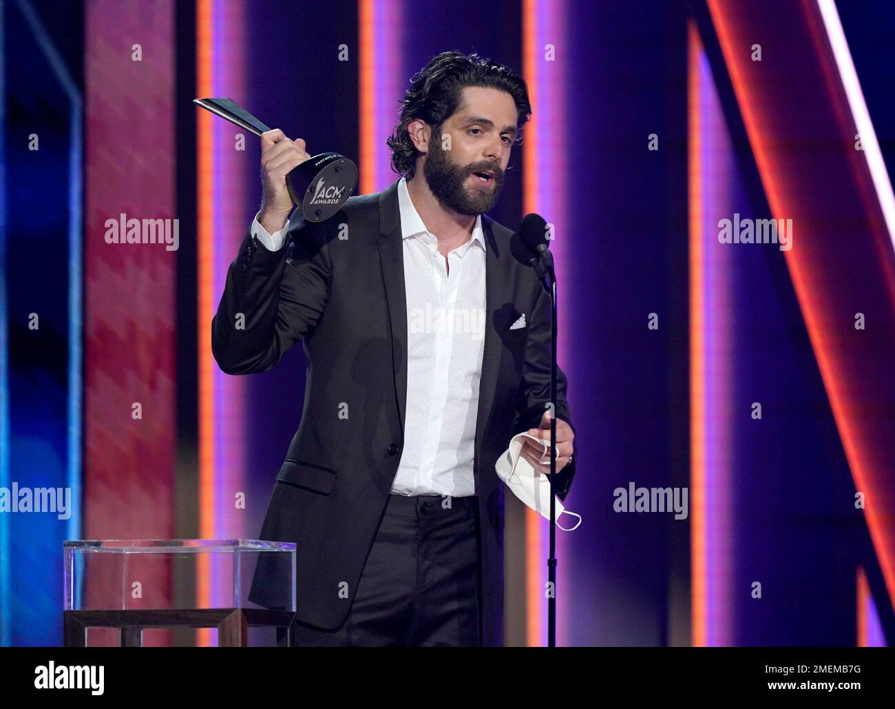 Thomas Rhett accepts the award for male artist of the year at the 56th ...
