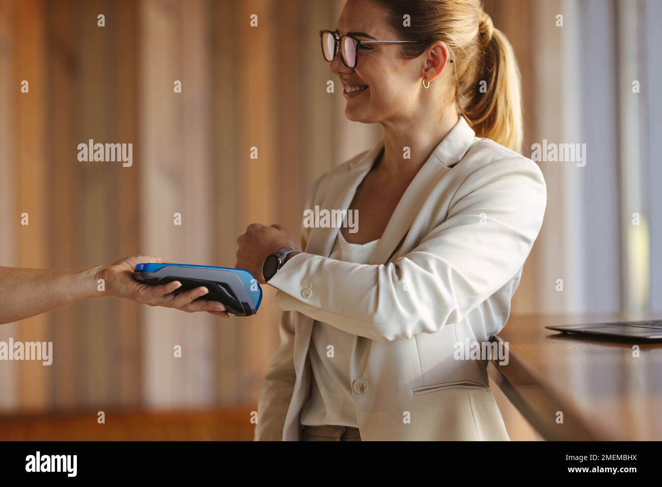 Contactless payment using smartwatch hi-res stock photography and ...