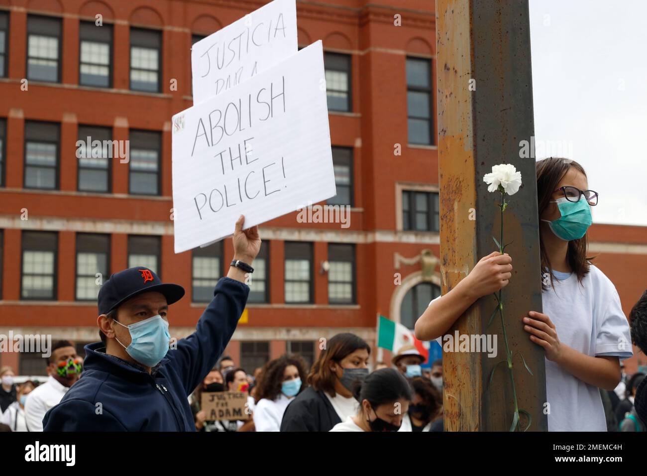 People attend a peace walk honoring the life of police shooting victim ...