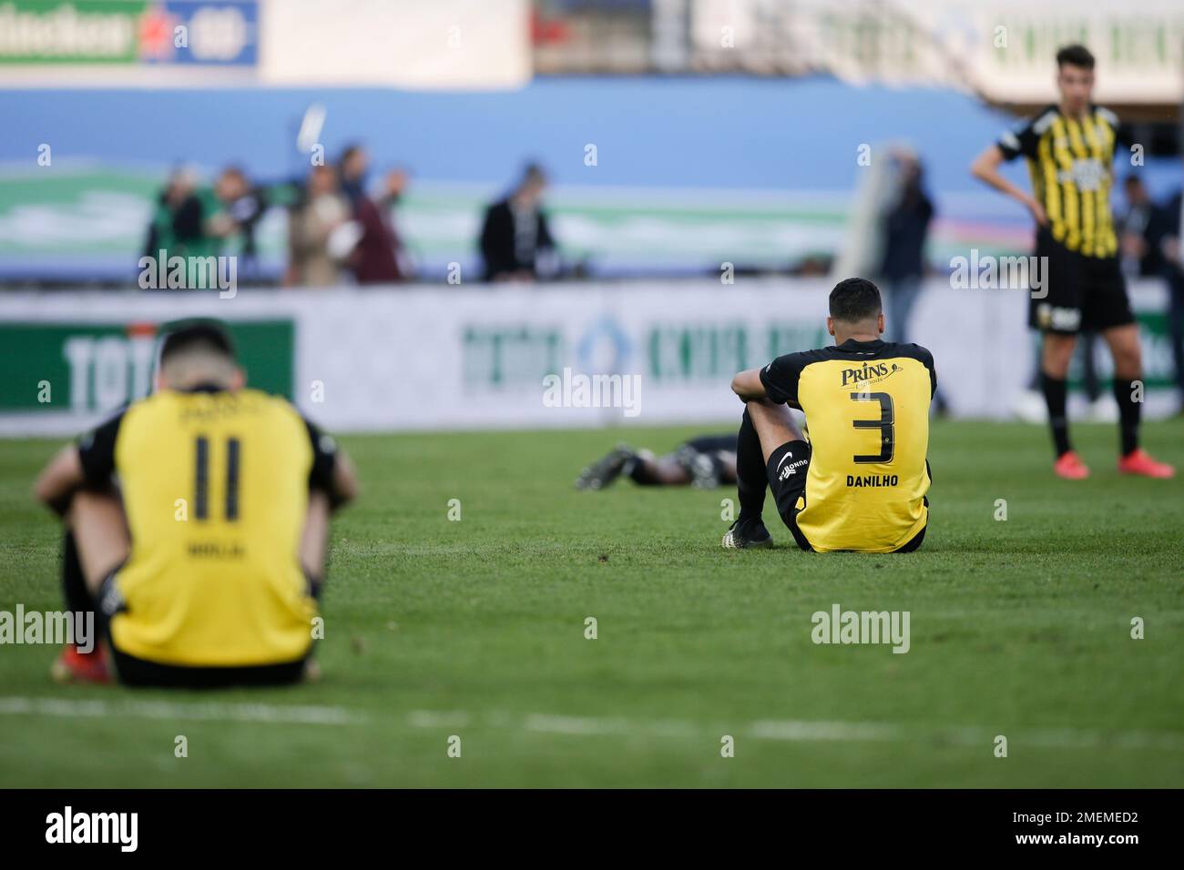 Vitesse players sit defeated on the pitch after their loss in the TOTO ...