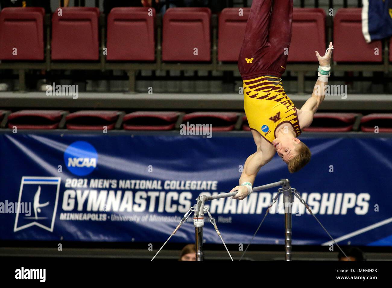 Minnesota's Shane Wiskus competes on the high bar during the NCAA men's ...
