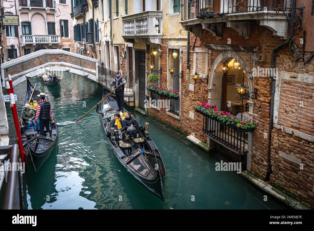 Two gondolas at the narrow canal in Venice, Italy at winter time Stock ...