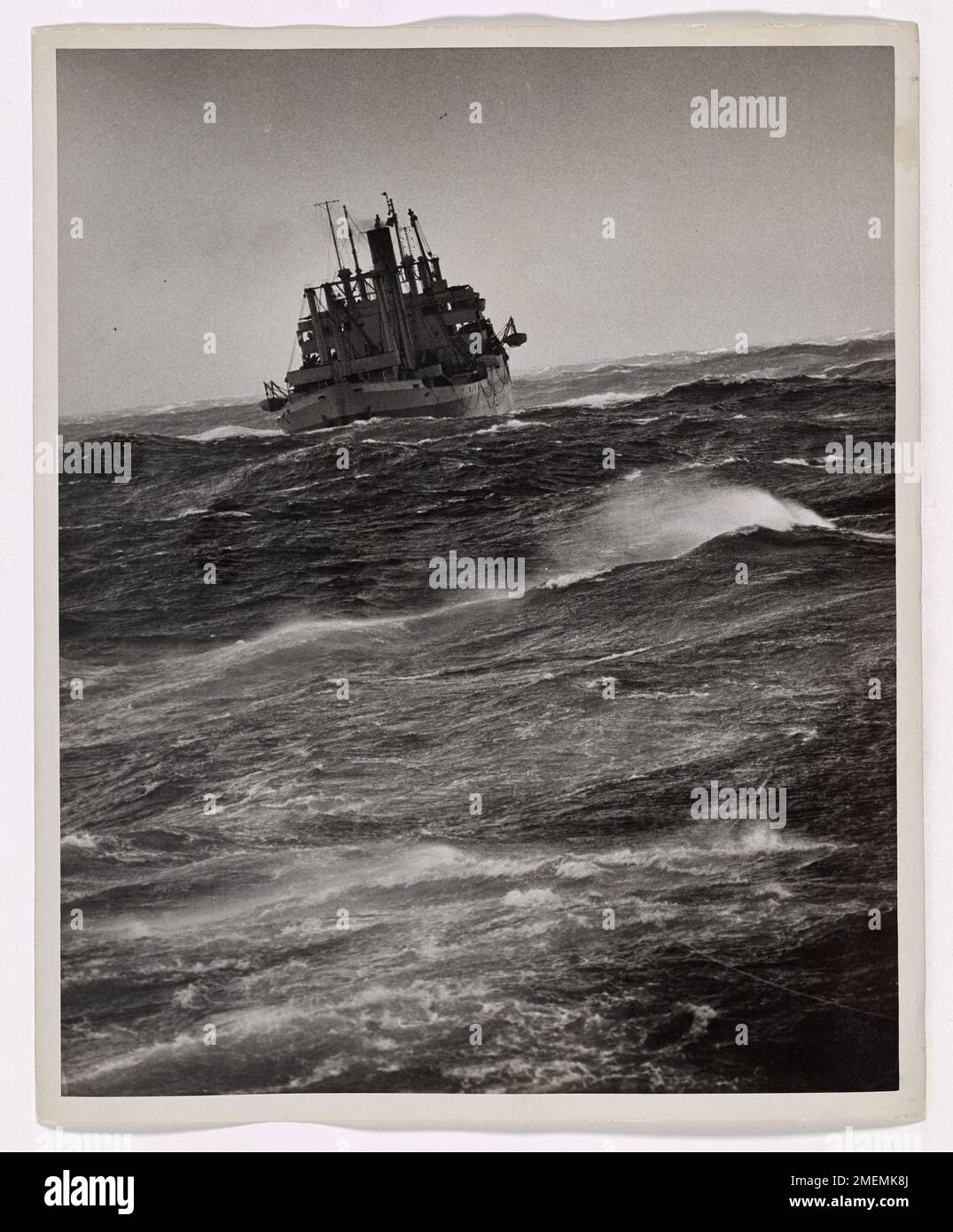 Cargo Ship Drives Through Ground Swell. This image depicts a cargo ship ...