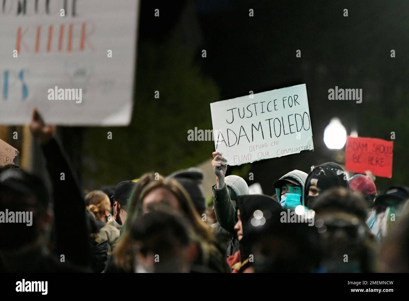 People protest the March 29th shooting and killing of 13 year-old Adam ...