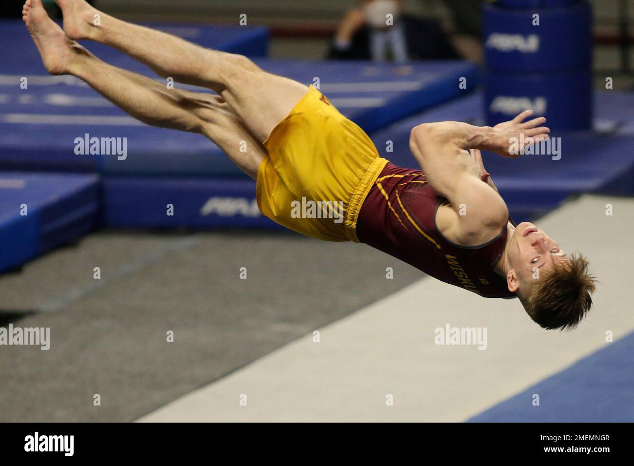 Minnesota's Shane Wiskus competes in the floor exercise during the NCAA ...