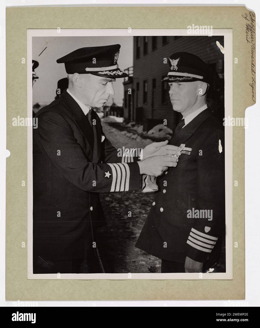 Captain Charles W. Thomas of Long Beach, California, receives the ...