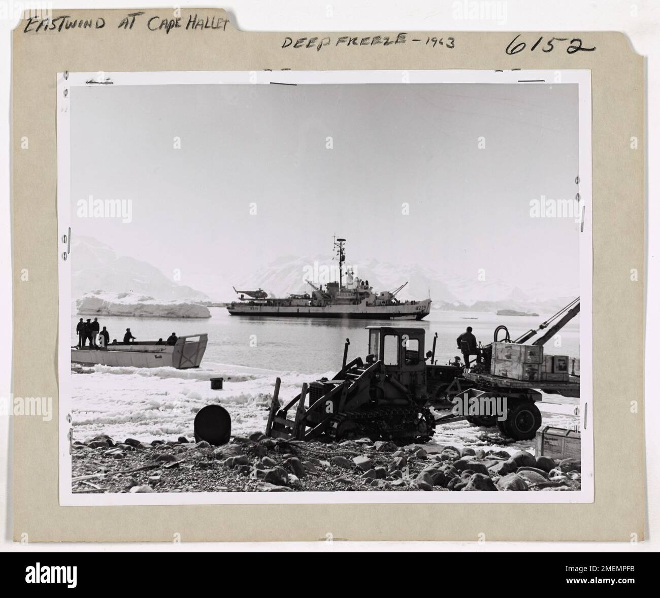 The Coast Guard icebreaker Eastwind offloads supplies and equipment at ...