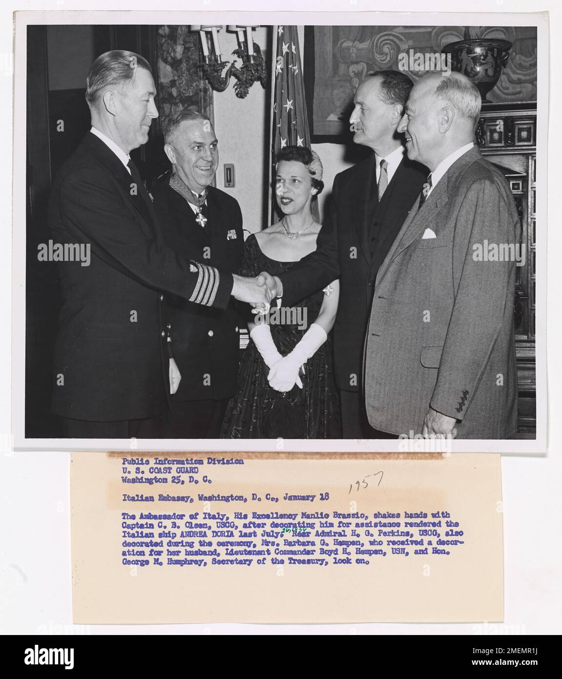 Captain C.B. Olsen of the U.S. Coast Guard is decorated by the ...