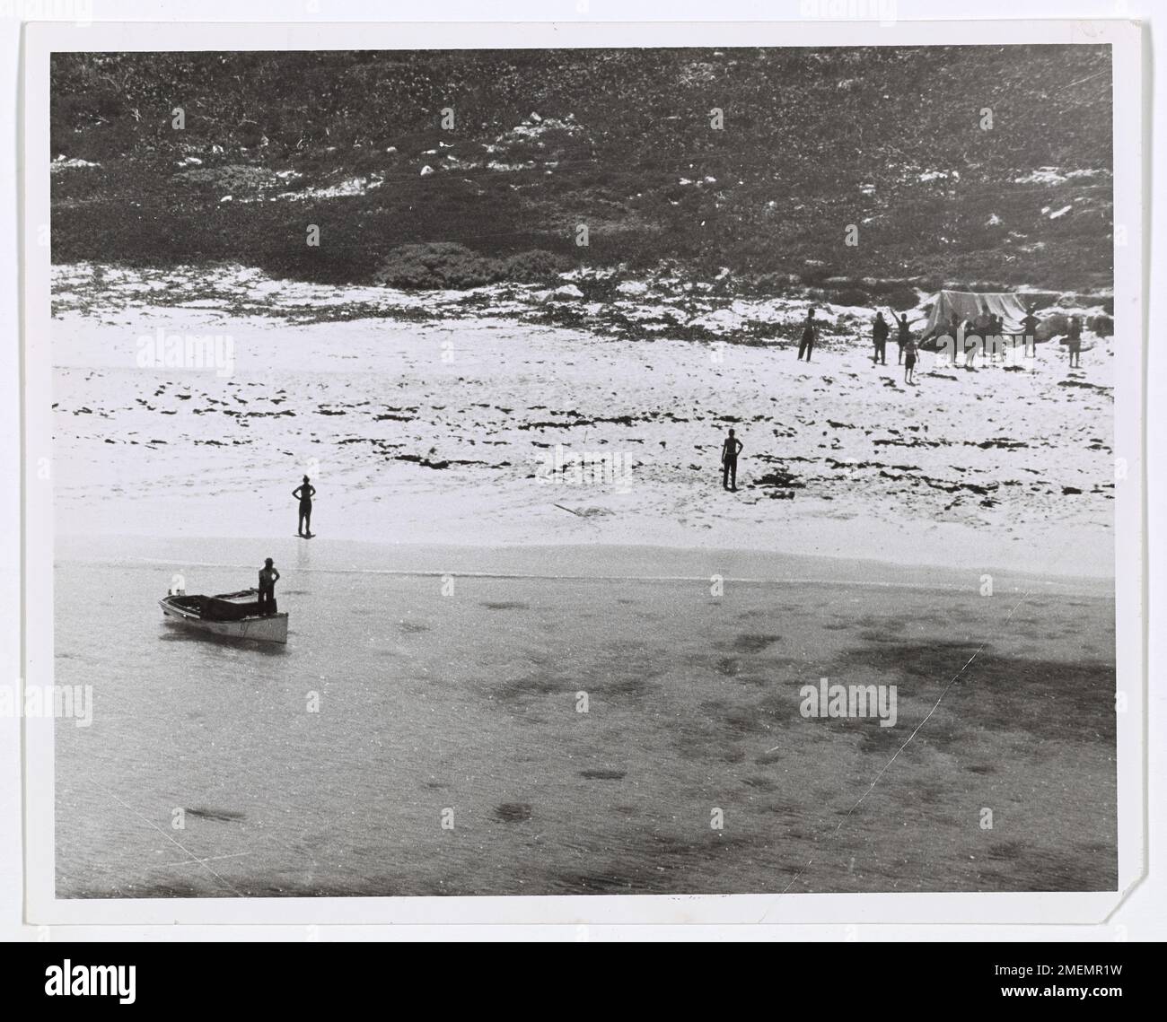 A Coast Guard aircraft locates a group of 16 Cuban refugees stranded on ...