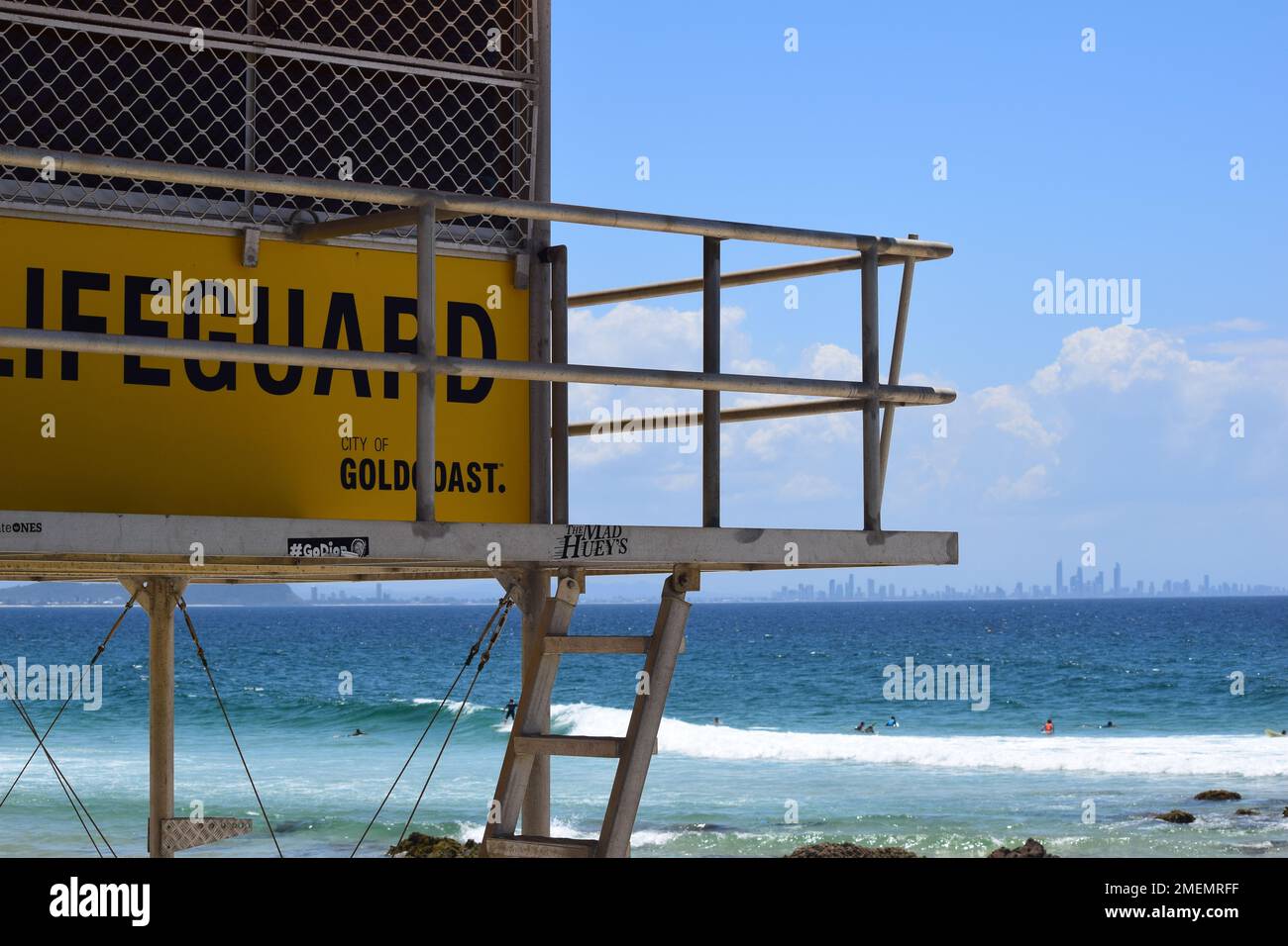 A lifeguard building on the beach with a blue ocean in the background ...