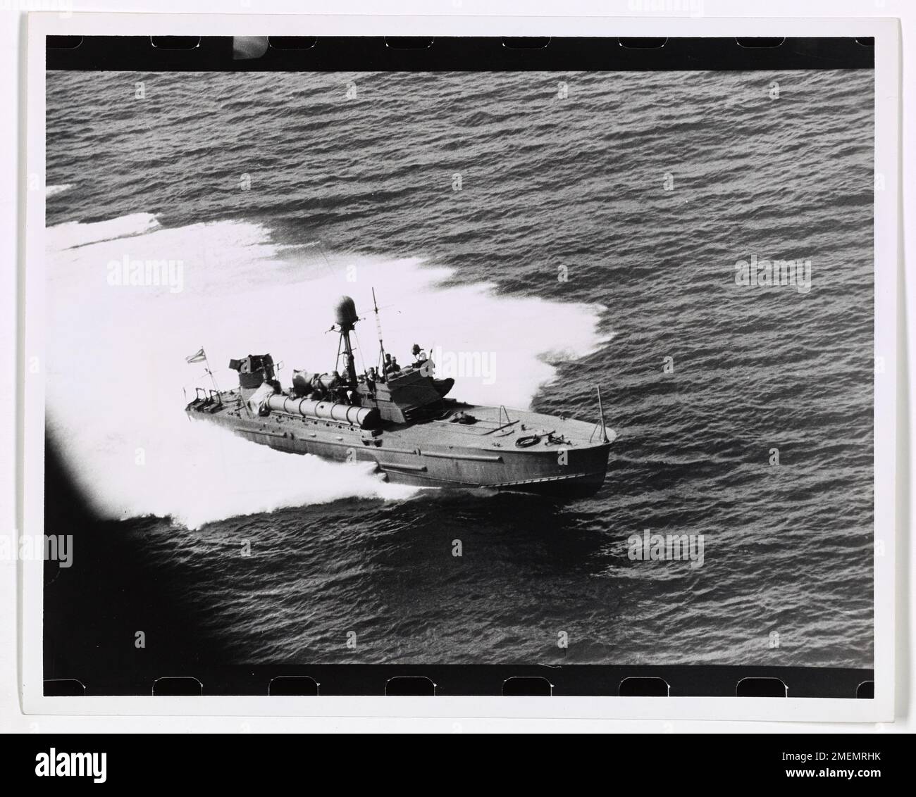 This image shows a Communist Cuban naval PT boat at battle stations off ...