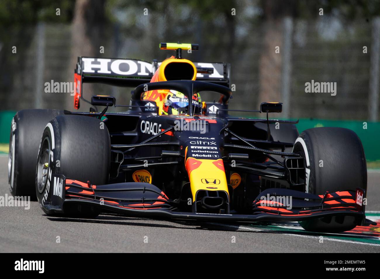 Red Bull driver Sergio Perez of Mexico steers his car during free practice for Sunday's Emilia ...