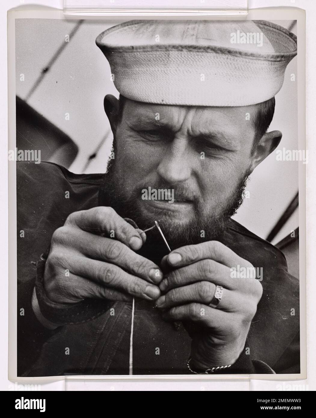 Steady, Mate. Easy Does It. This image depicts Coast Guardsman Tom R ...