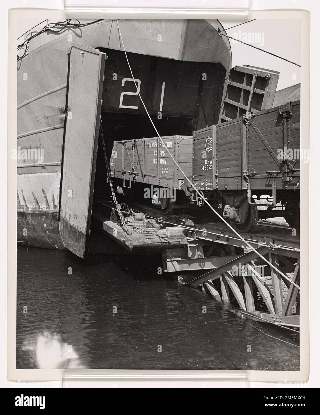 Freight Cars Roll Into Jaws Of Coast Guard-manned LST. Freight cars of ...