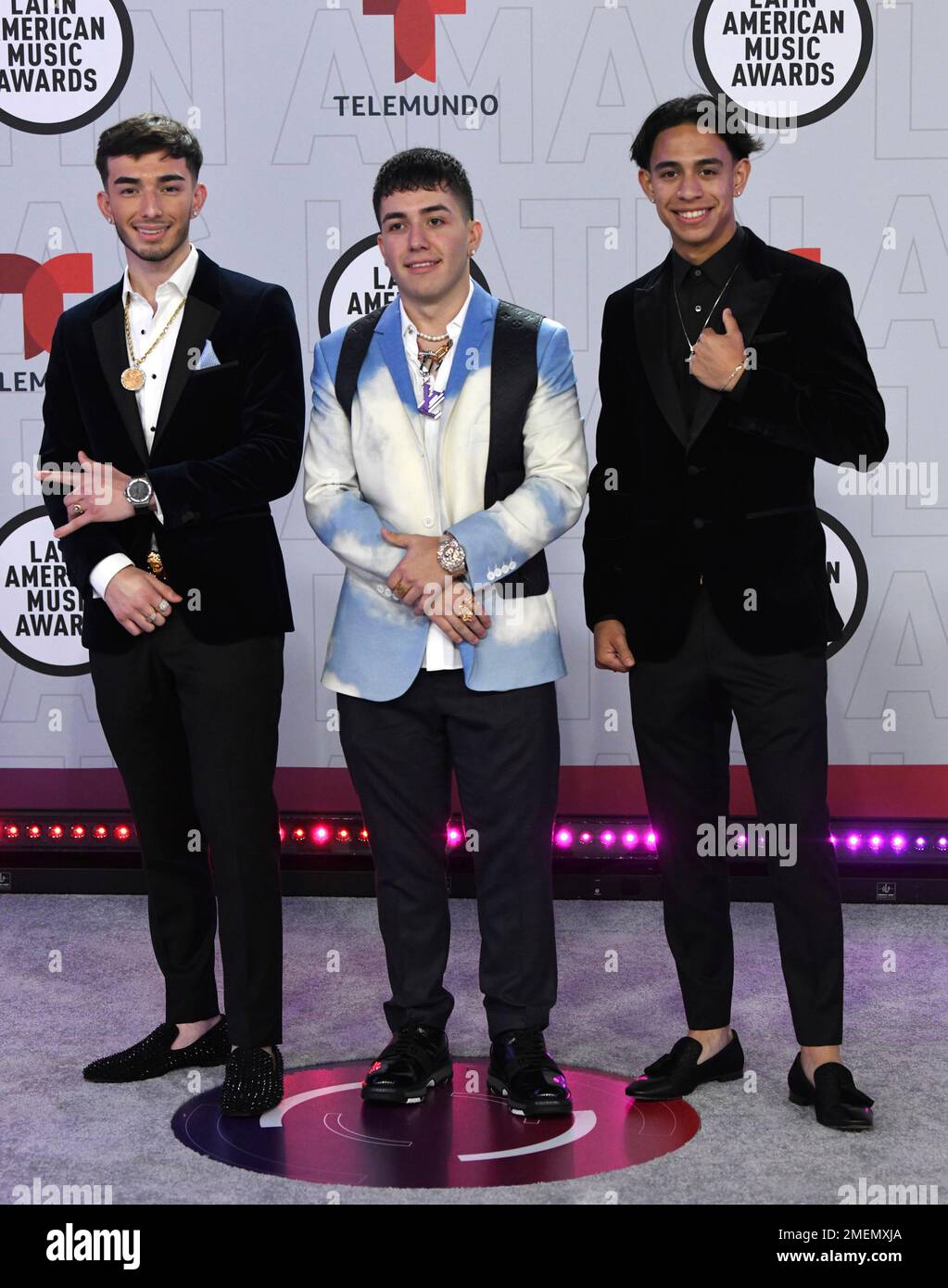 Musical group Eslabon Armado, from left, Bryan Tovar, Pedro Tovar, and ...