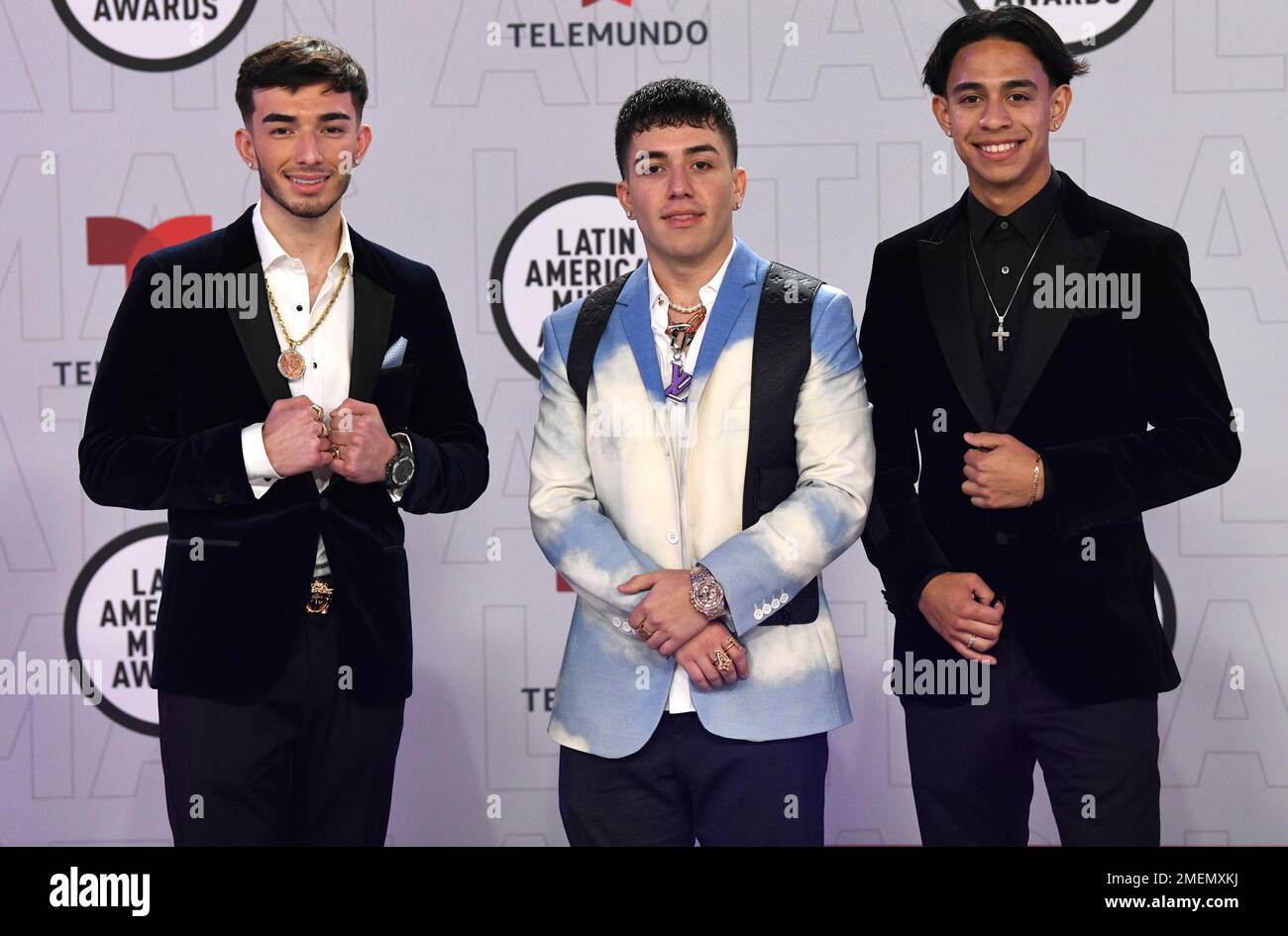 Musical group Eslabon Armado, from left, Bryan Tovar, Pedro Tovar, and ...