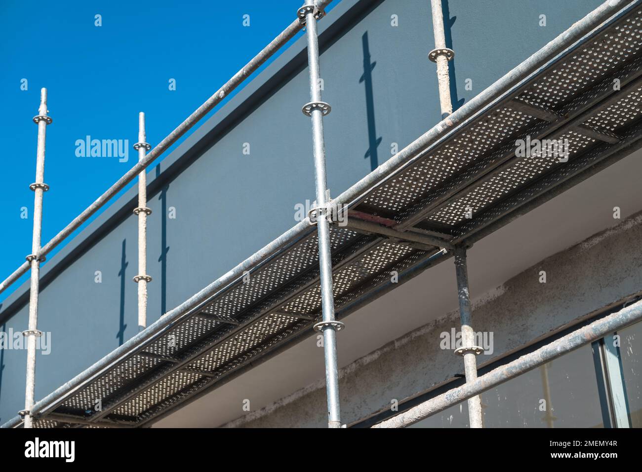 Construction scaffolding built on a new apartment building. new ...