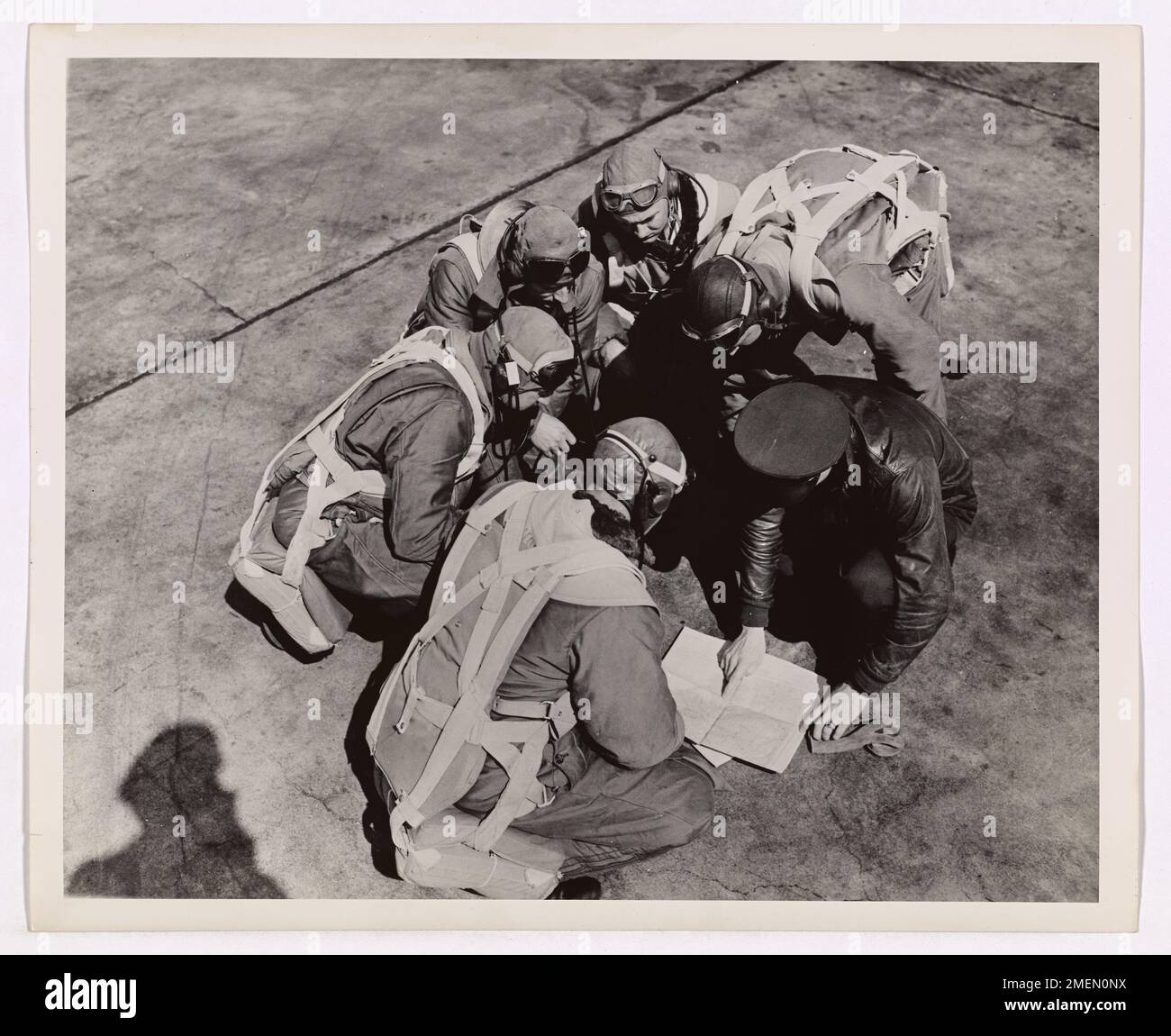 A U.S. Coast Guard aircraft conducts flight planning for a convoy ...