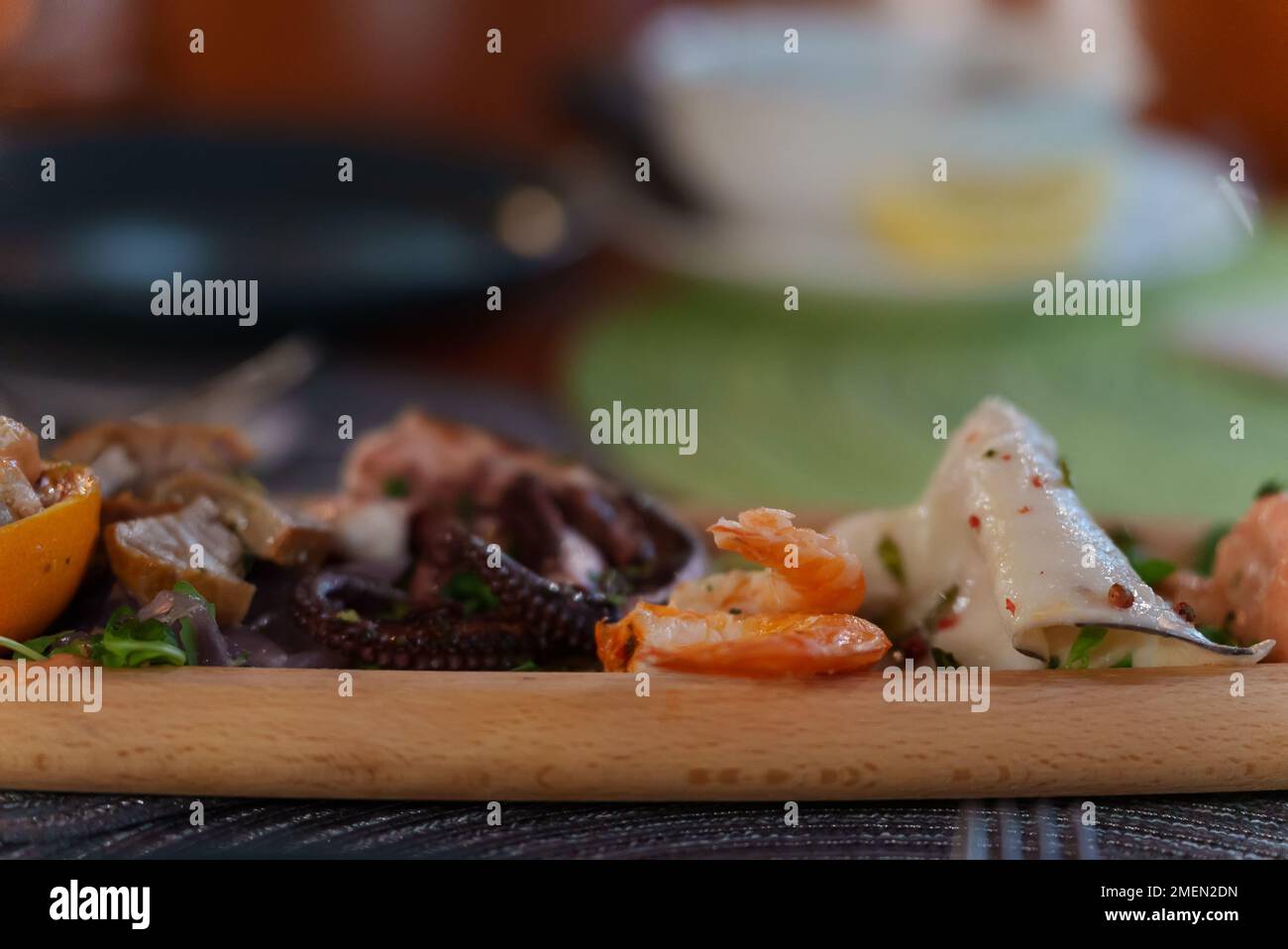 Marine plate. Mix of shrimp, fish, octopus Stock Photo - Alamy