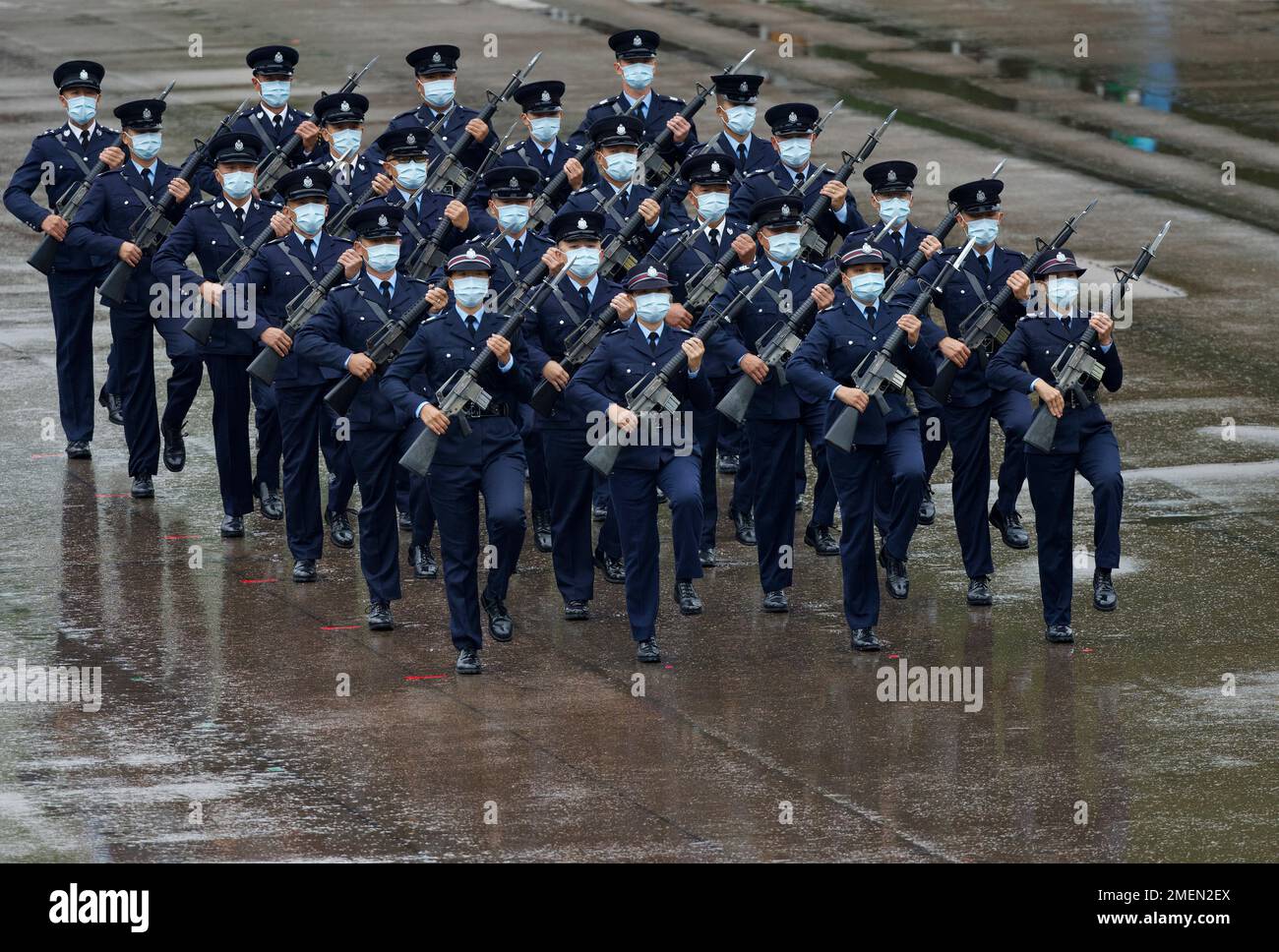 Hong Kong police show their new goose step marching style on the ...