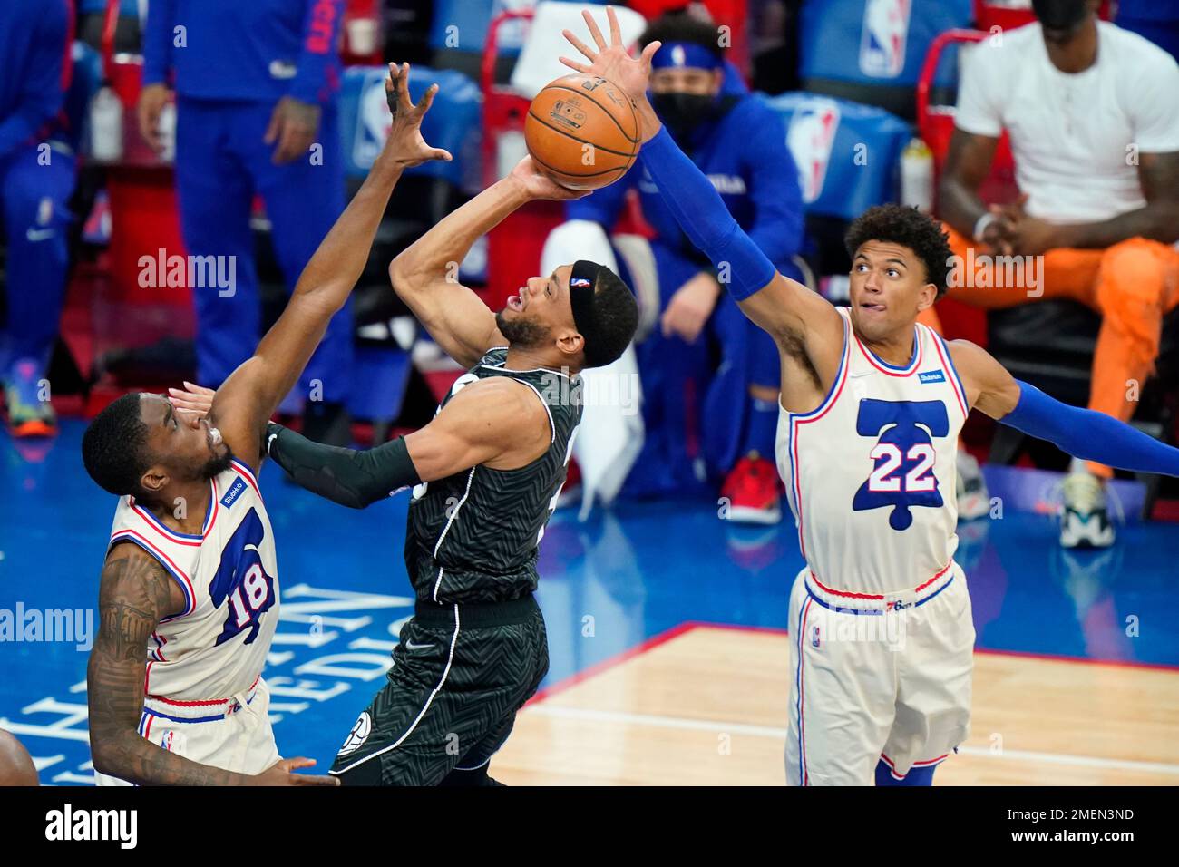 Brooklyn Nets' Bruce Brown, center, goes up for a shot against ...
