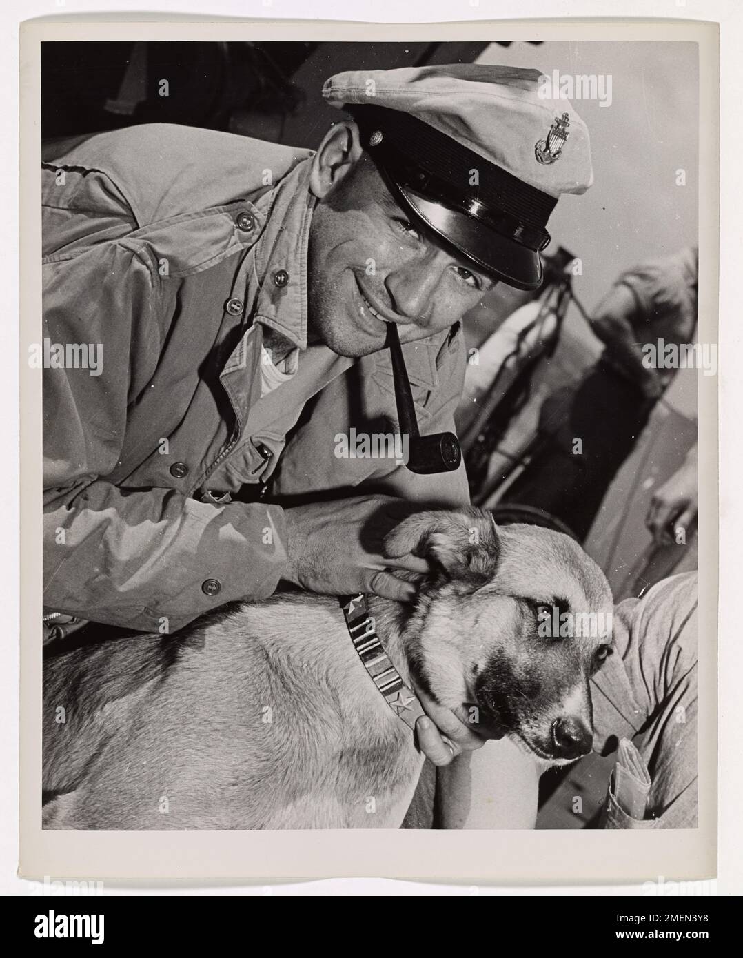 'Scupper,' the Coast Guard LST mascot, proudly displays his ribbons for ...