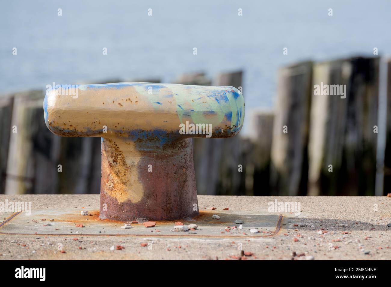 Old mooring on abandoned pier. Mooring is the type a loop of rope is ...