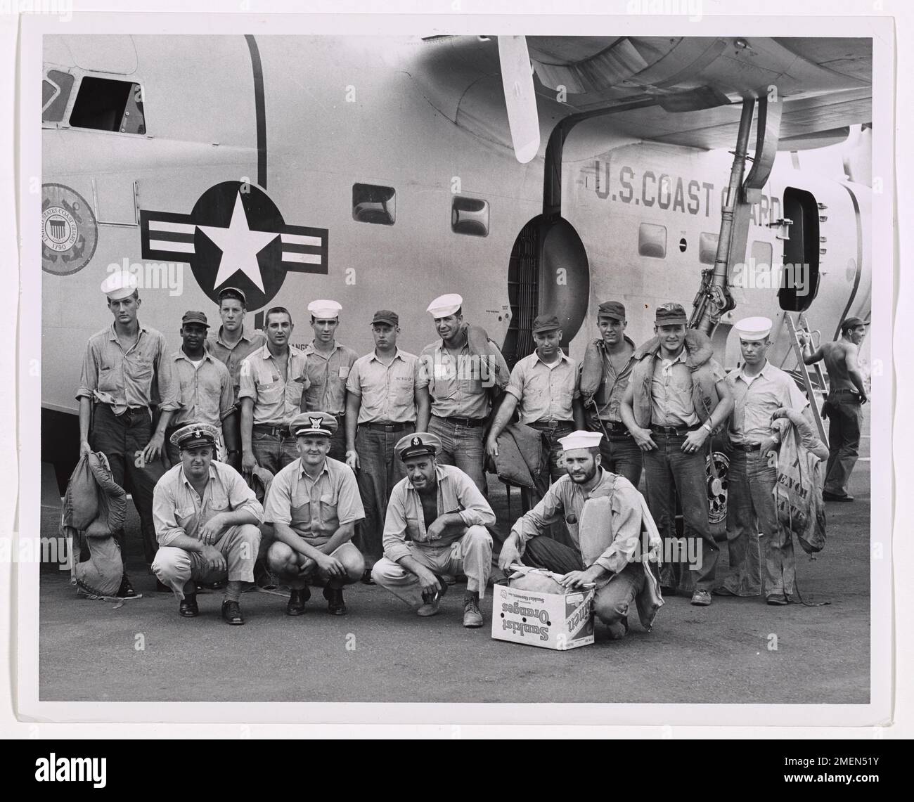 This image shows U.S. Coast Guardsmen who were evacuated from the ...