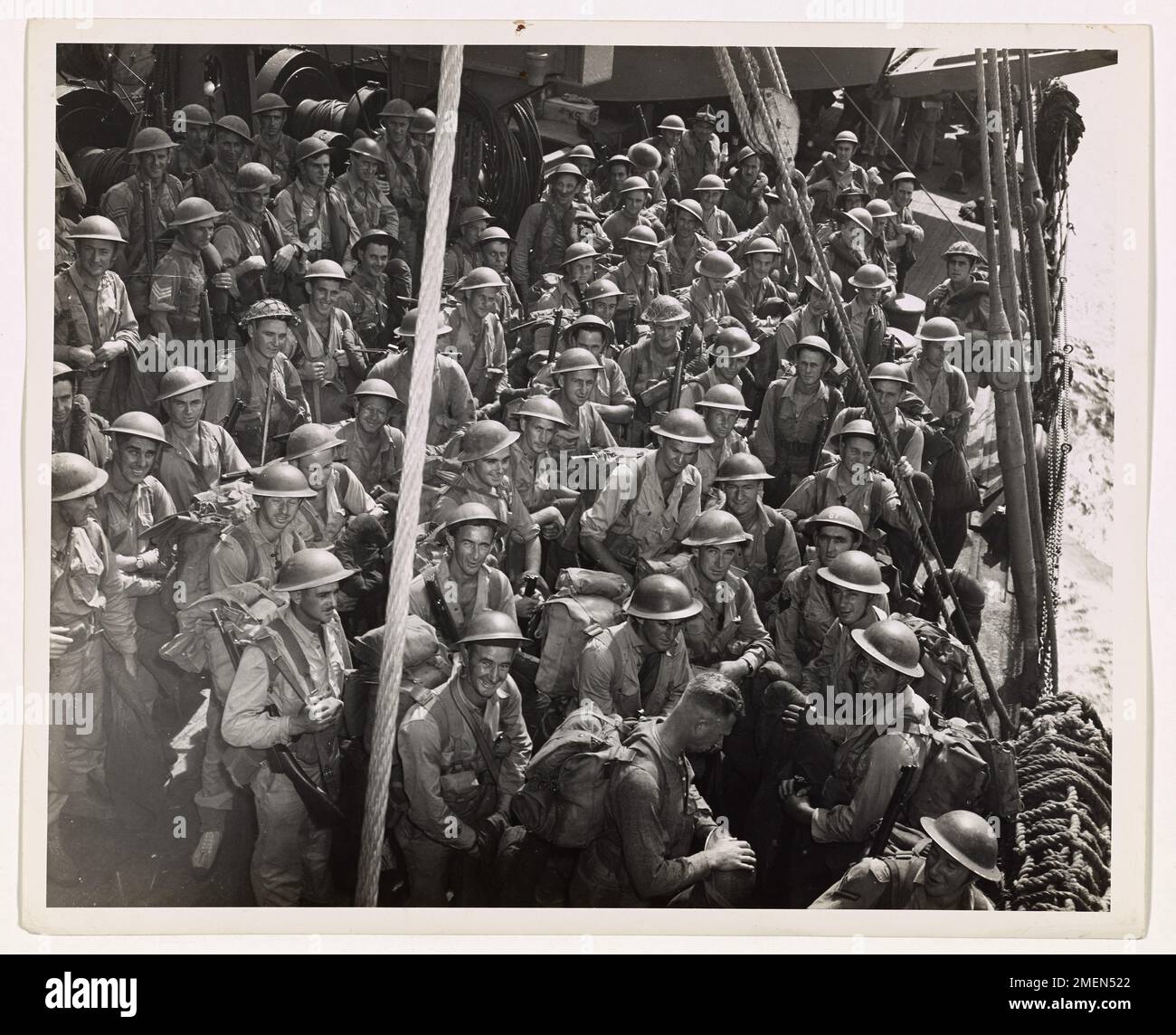 British soldiers are seen aboard a Coast Guard-manned transport ship in ...