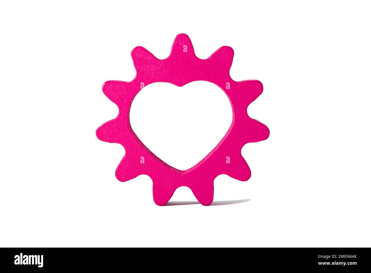 Red gear or cogwheel isolated on white background copy space, heart ...