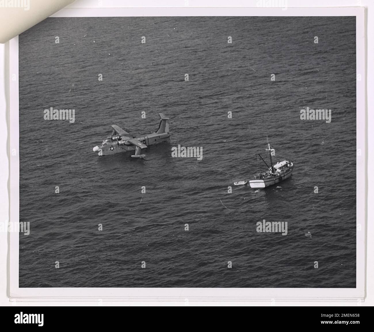 A Long Armed Helping Hand. This image depicts a Coast Guard plane ...