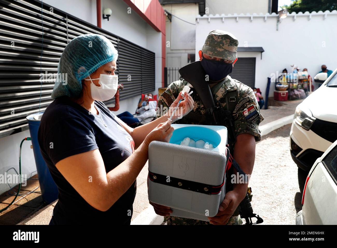 Nurse Zoraida Penayo prepares a shot of India's COVAXIN vaccine for ...