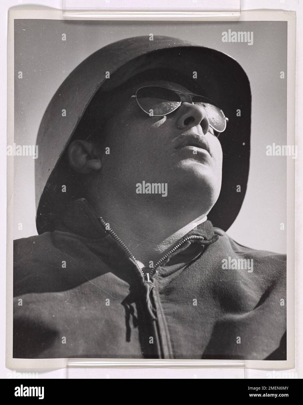 Coast Guardsman Boyce R. Nichols, Seaman Second Class, wears a battle ...