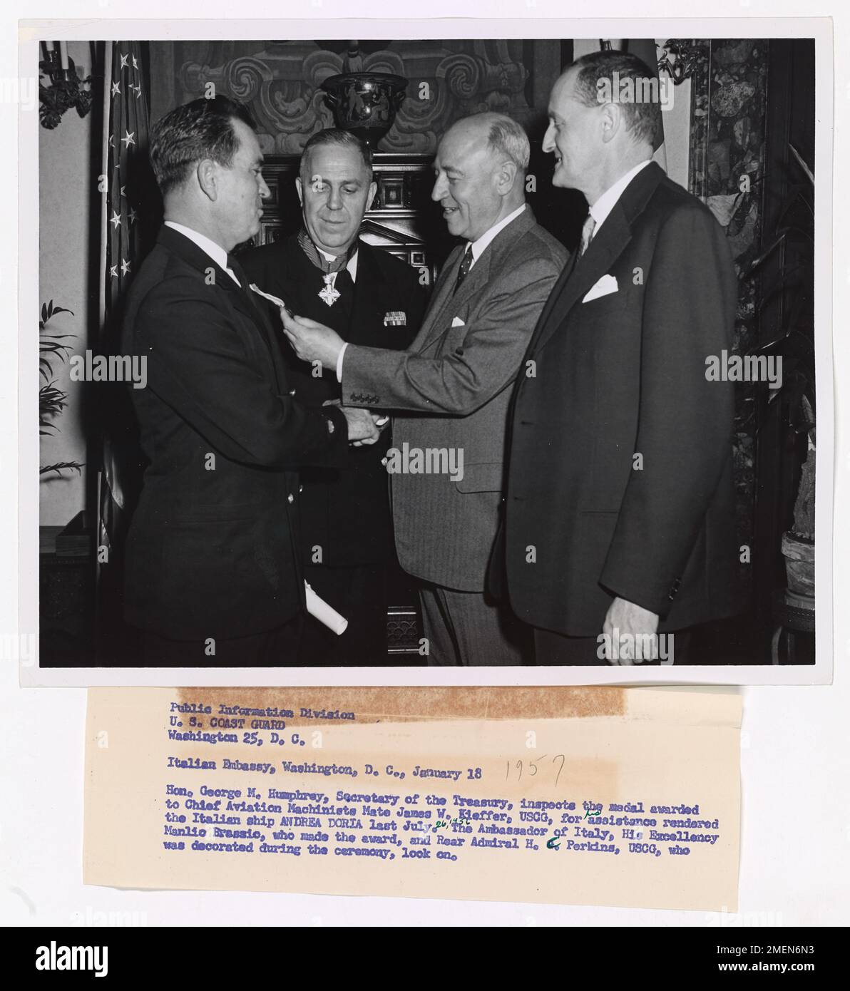 Chief Aviation Machinists Mate James W. Kieffer, USCG, receives a medal ...