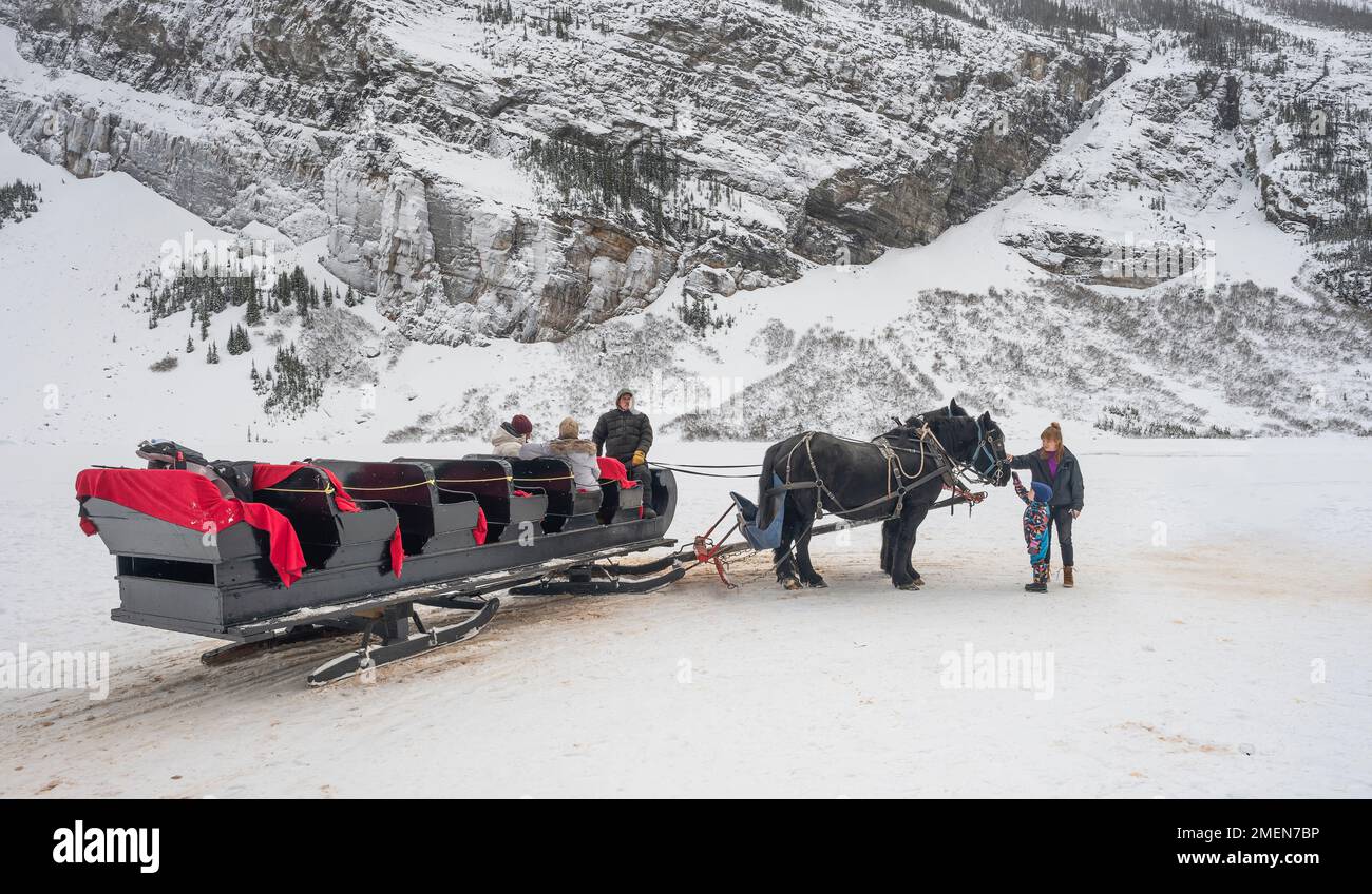 Lake Louise, Alberta, Canada – January 14, 2023: People gather around a ...