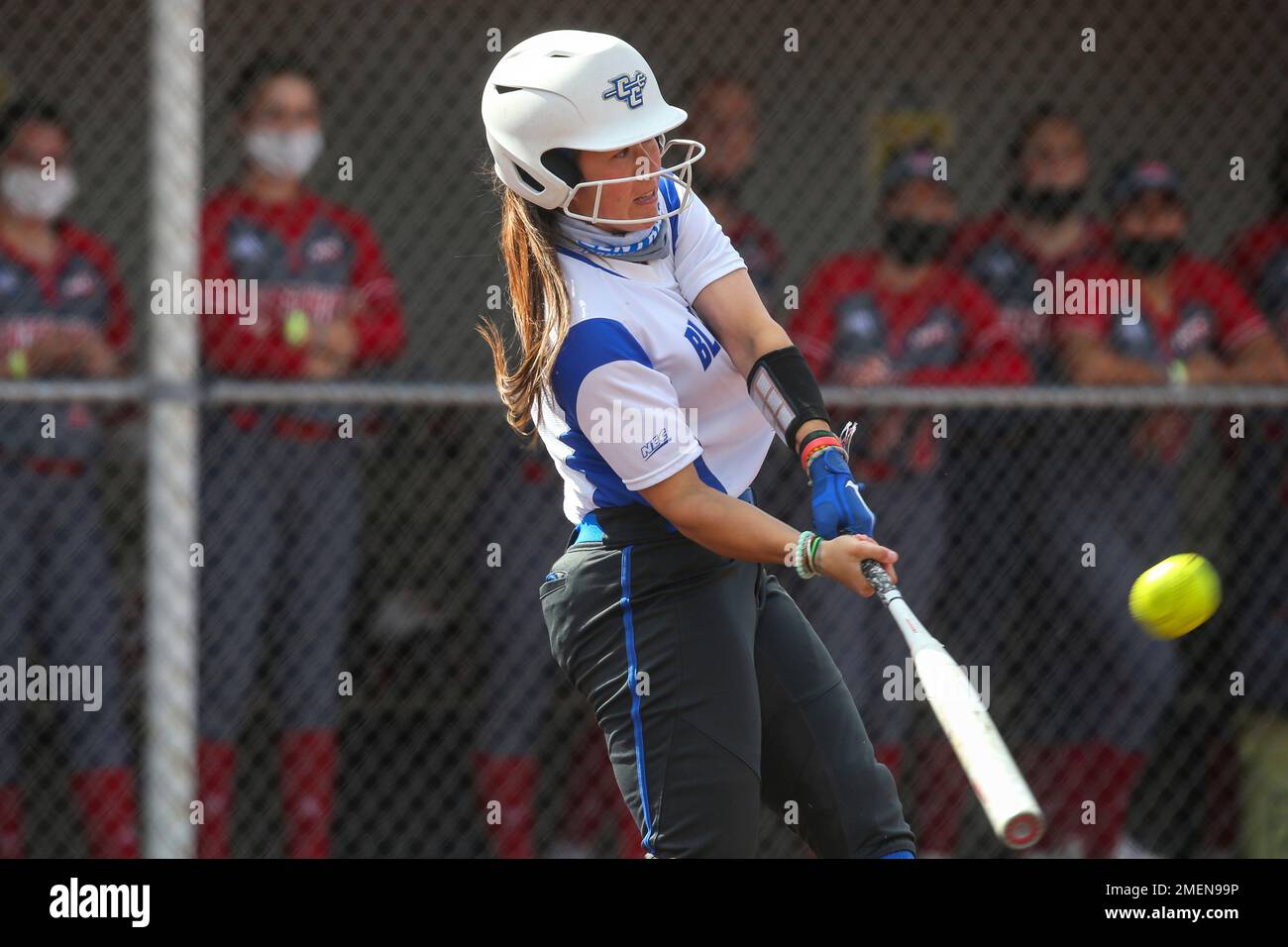 Central Connecticut State's Meg Dugas (20) hits a solo home run in the ...