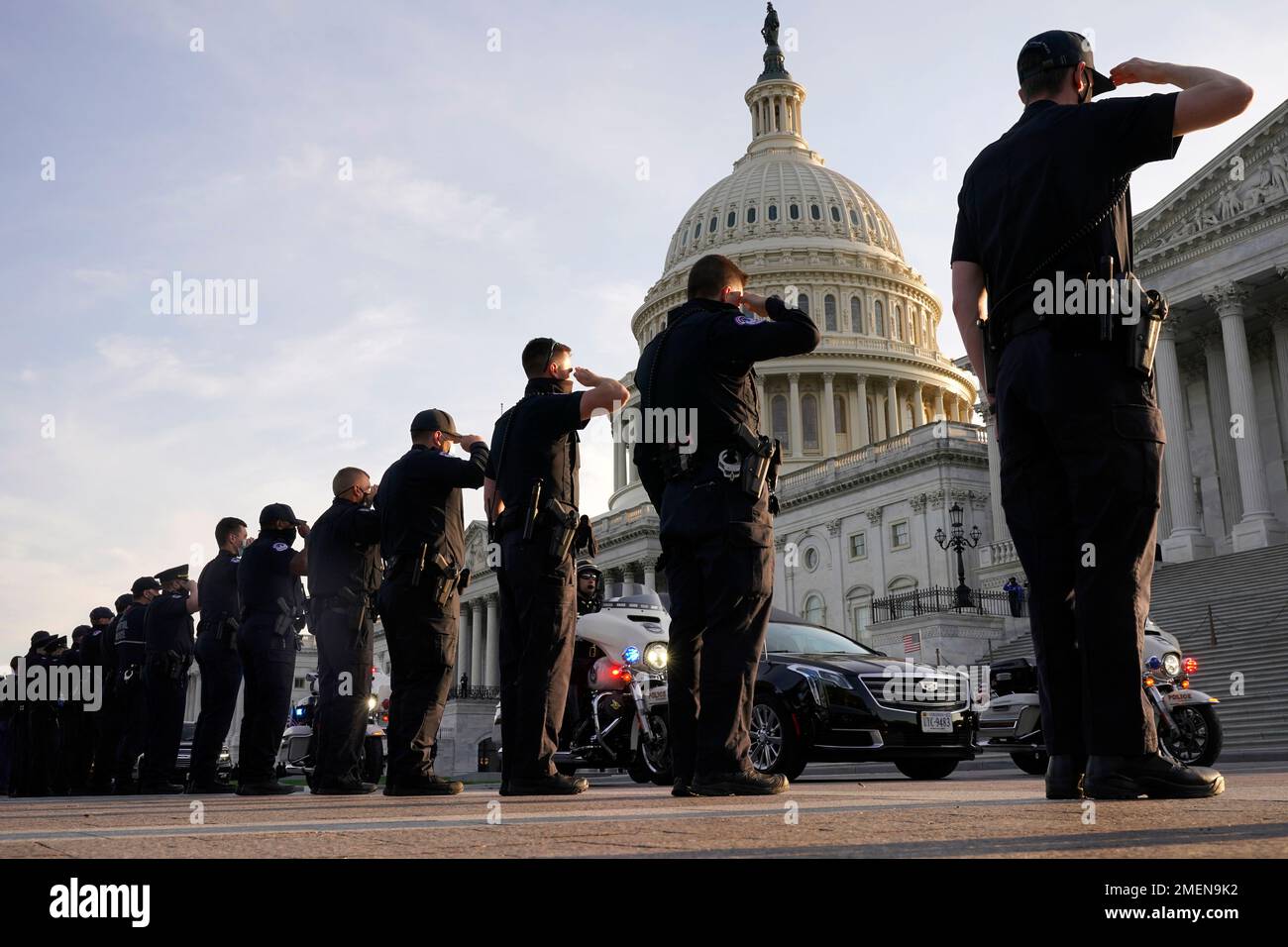 U.S. Capitol Police officers salute as the casket of slain U.S. Capitol ...