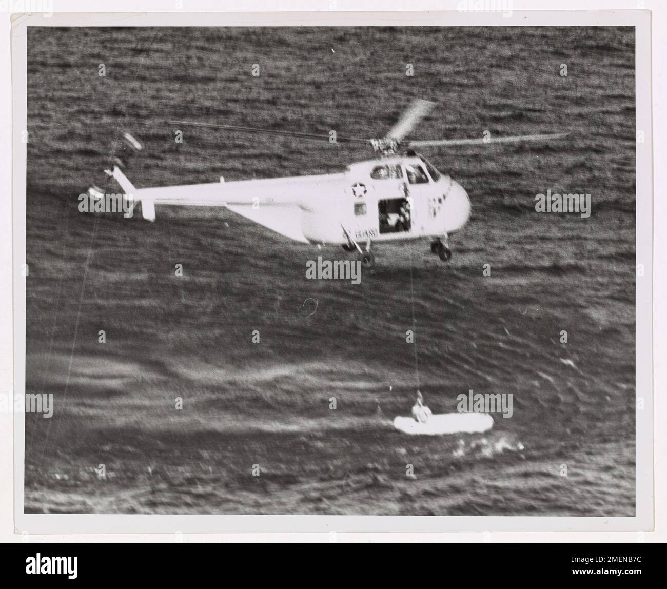 A Coast Guard helicopter rescues two Navy sailors who became stranded ...