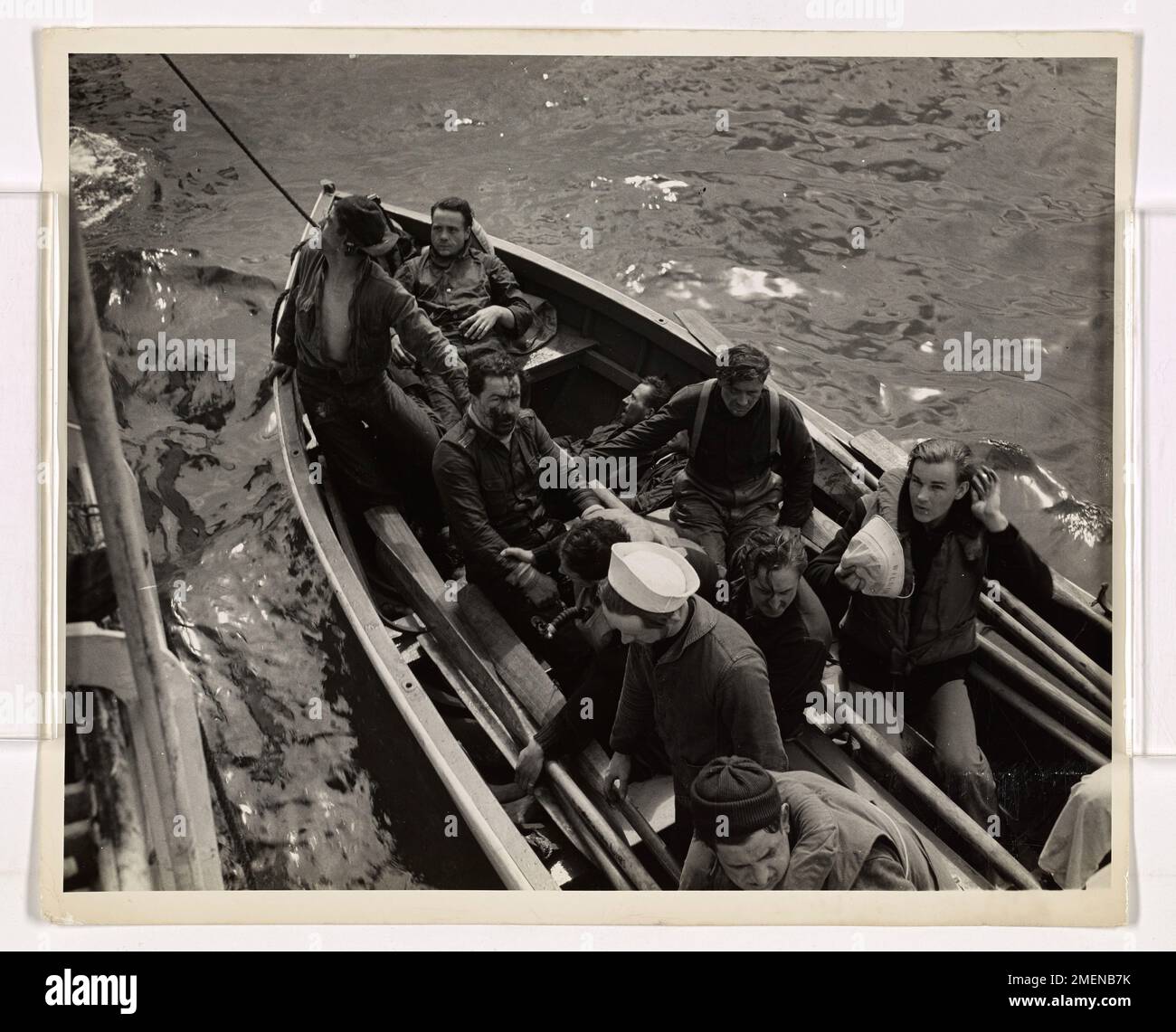 Captured German sailors, survivors of a sunken submarine, are ...