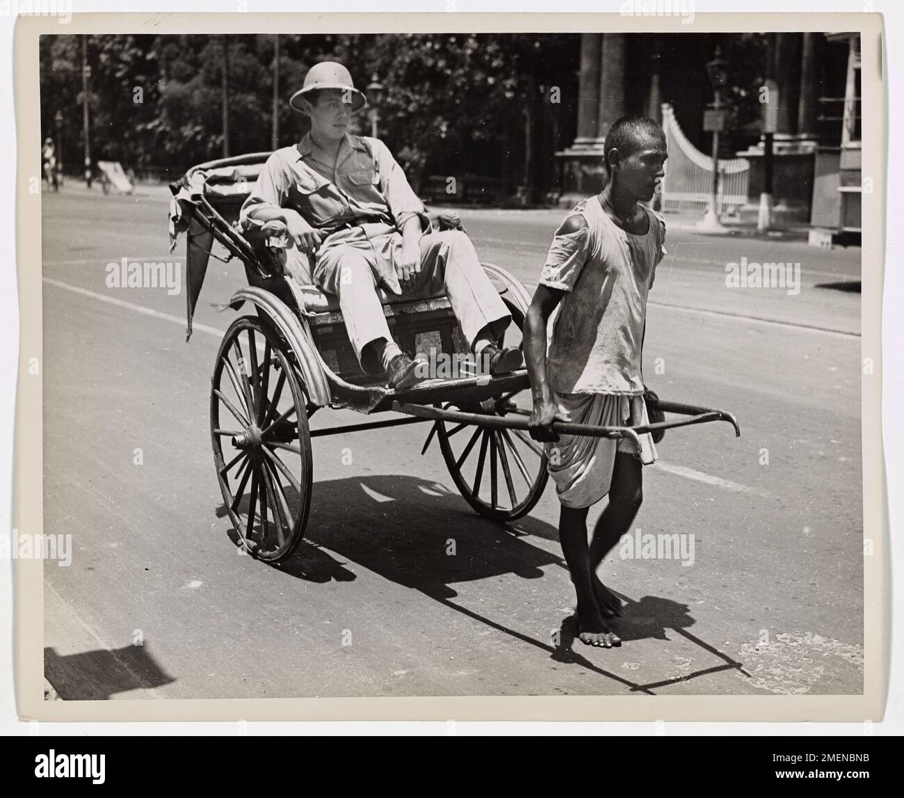 Coast Guardsman Milan Lacho, Yeoman Second Class, takes a rickshaw ride ...