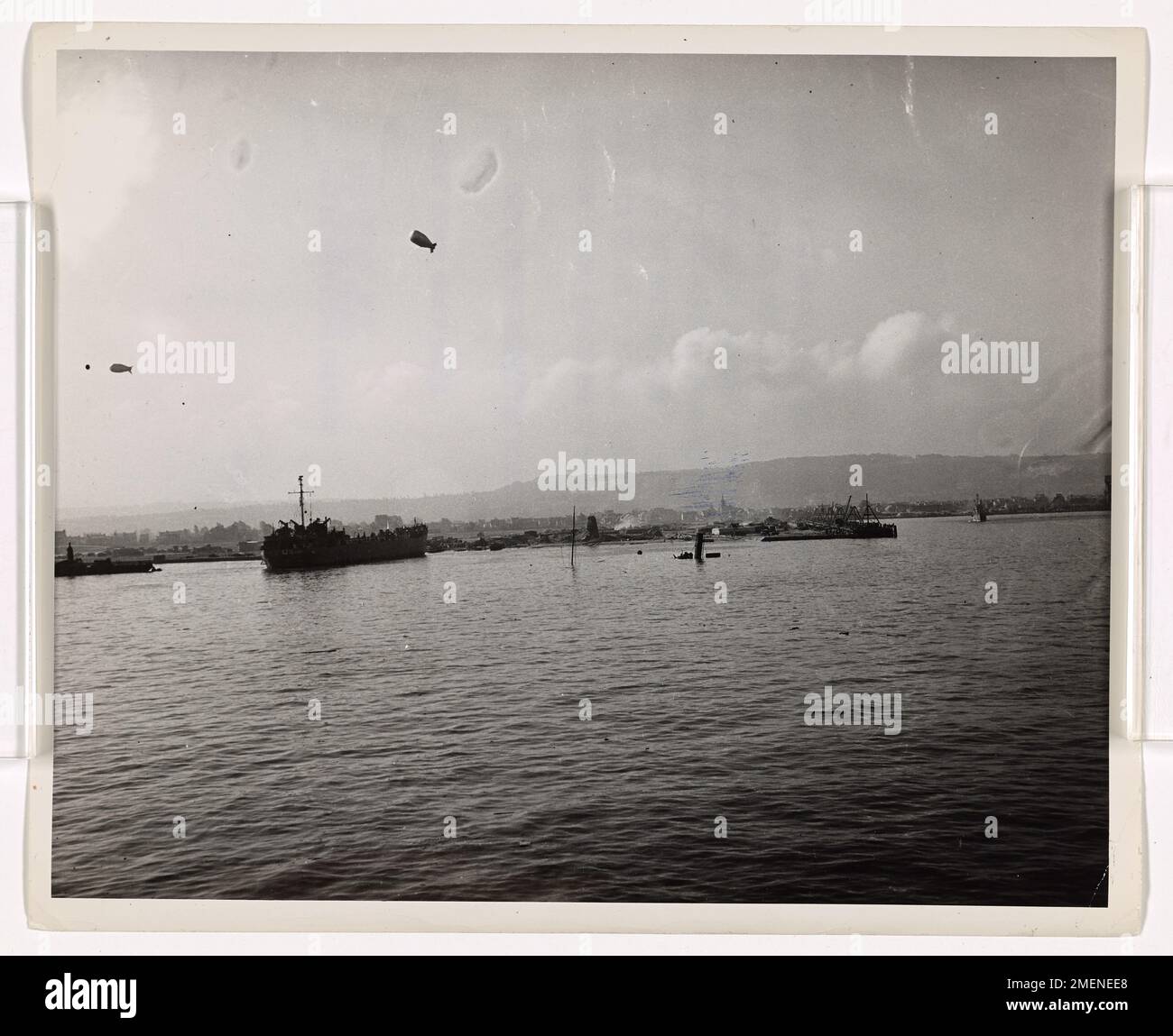 A Coast Guard-manned LST (Landing Ship Tank) approaches the French ...