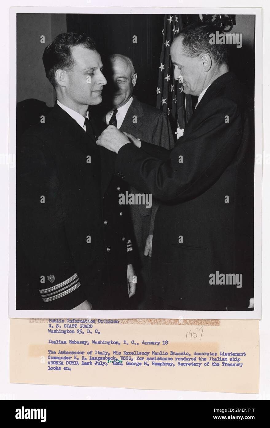 Lieutenant Commander K.H. Langenbeck of the U.S. Coast Guard is awarded ...