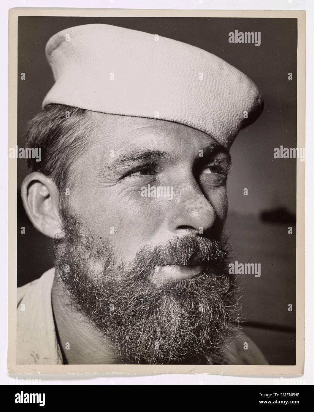 This image features Coast Guardsman Kenneth I. Stasser, a Coxswain ...