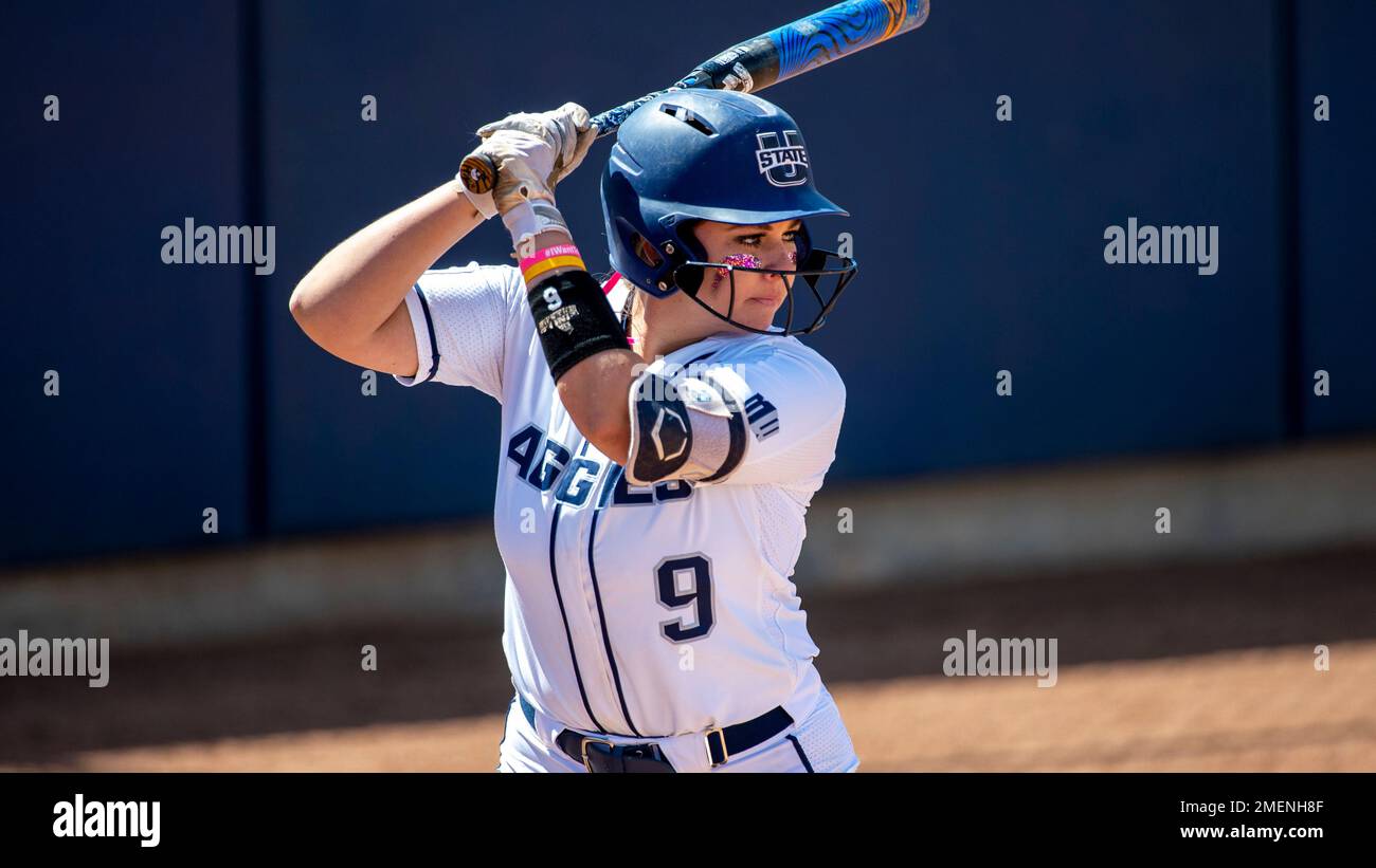 Utah St. infielder Kennedy Hira (9) bats during an NCAA softball game ...