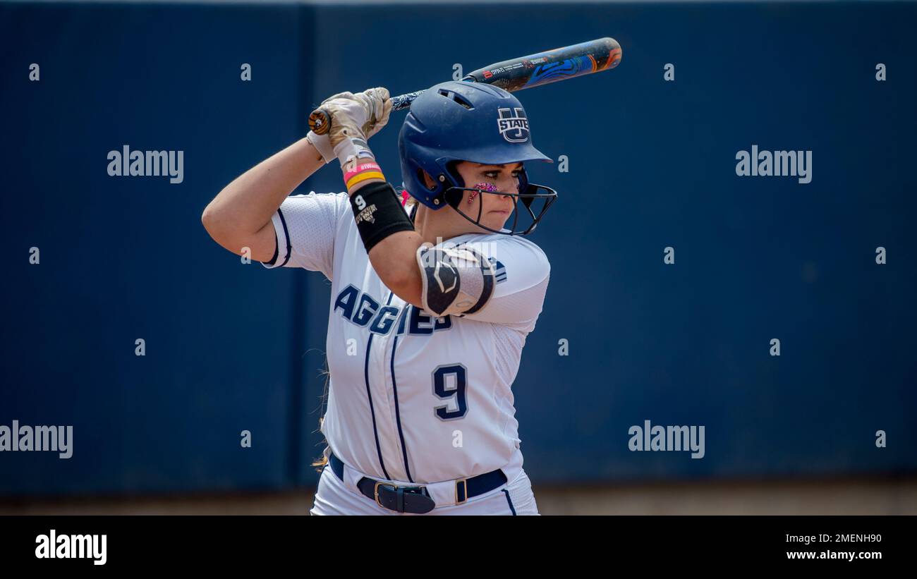 Utah St. infielder Kennedy Hira (9) bats during an NCAA softball game ...