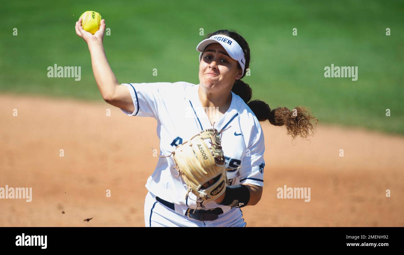 Utah St. third baseman Zaia Castruita (34) throws during an NCAA ...
