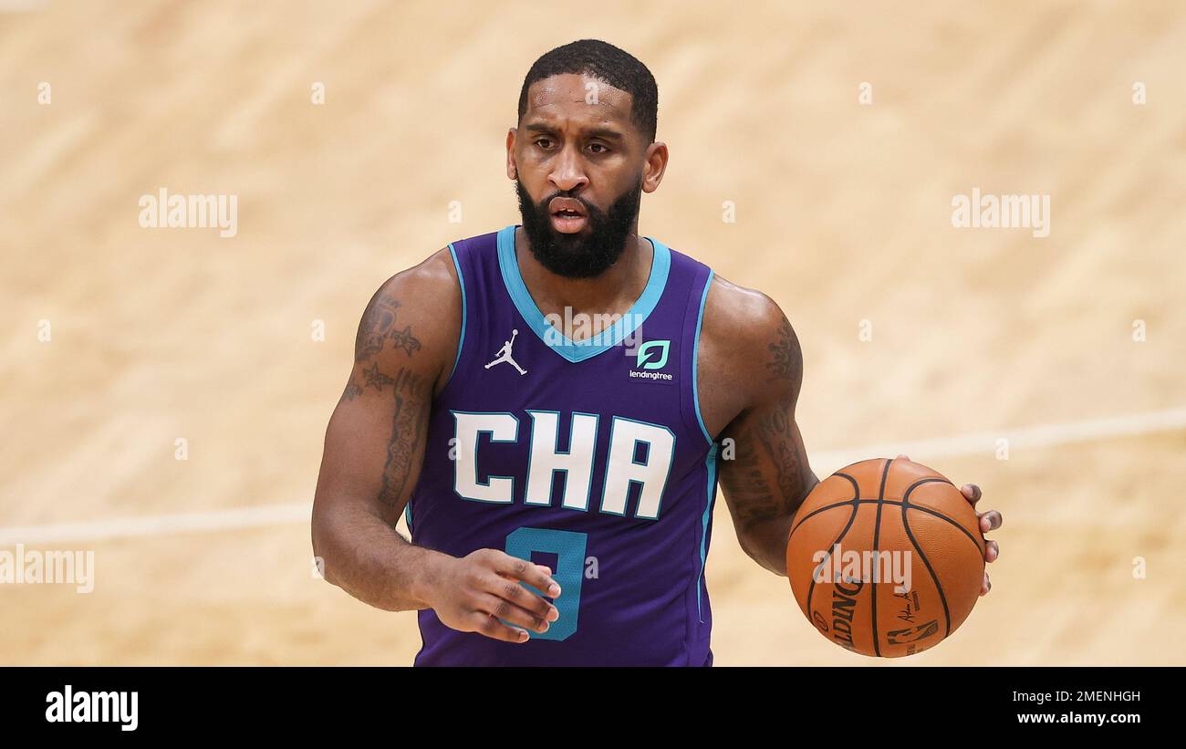 Charlotte Hornets guard Brad Wanamaker brings the ball up court against ...