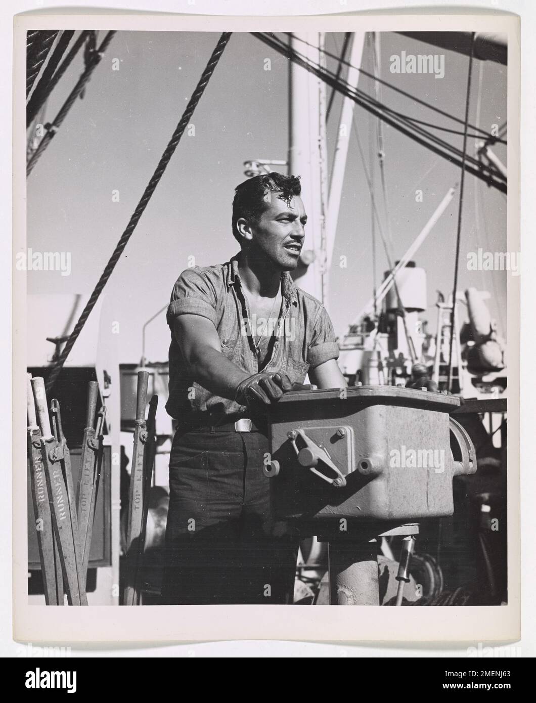 Actor Cesar Romero is seen aboard a Coast Guard-manned transport ship ...